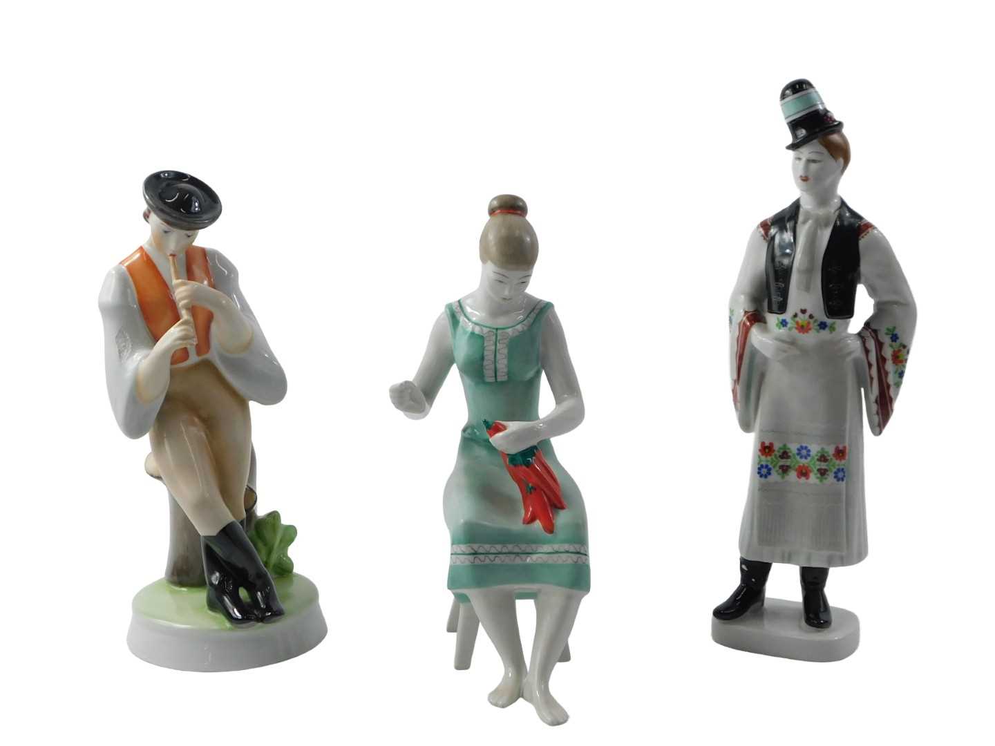 Lot 221 - Three Hollohaza Hungarian porcelain figures,