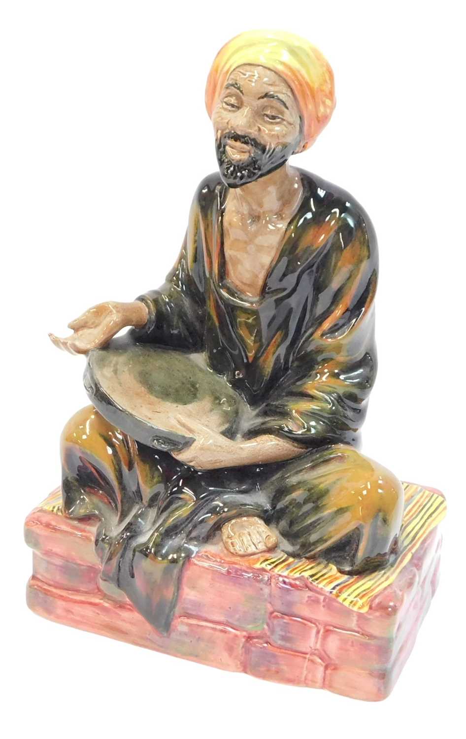 Lot 45 - A Royal Doulton figure modelled as Mendicant,