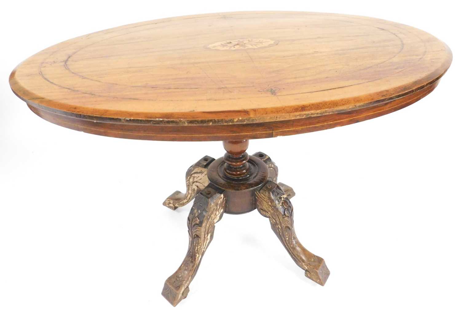 Lot 665 - A Victorian walnut loo table with inlaid